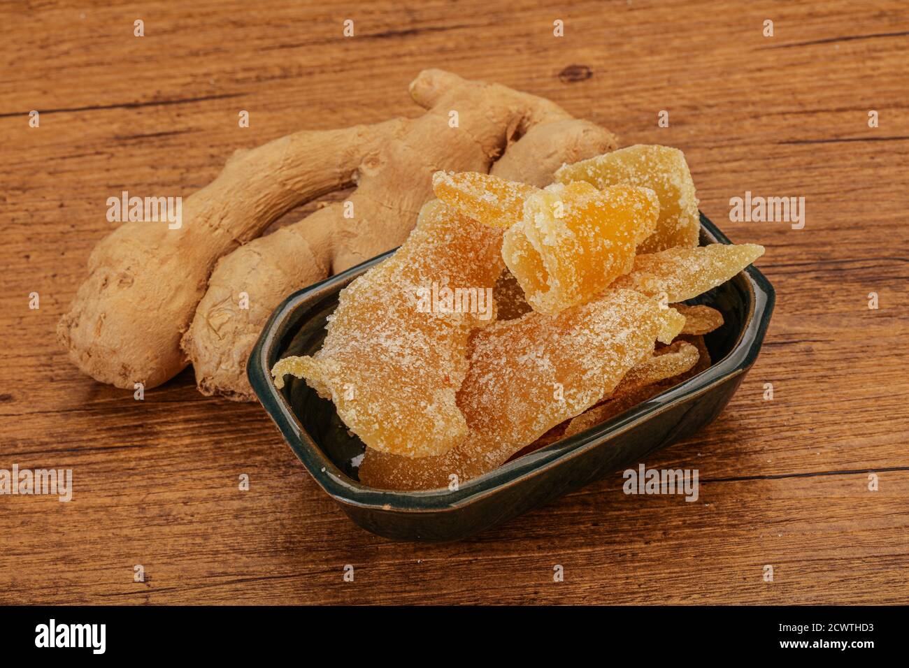 Dry sweet ginger snack in the bowl Stock Photo - Alamy