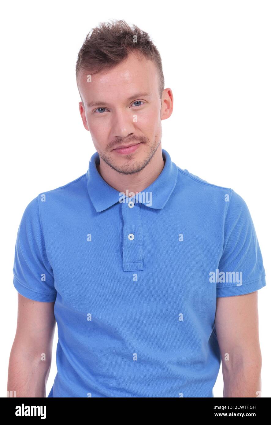 cropped portrait of a young casual man looking into the camera with a ...