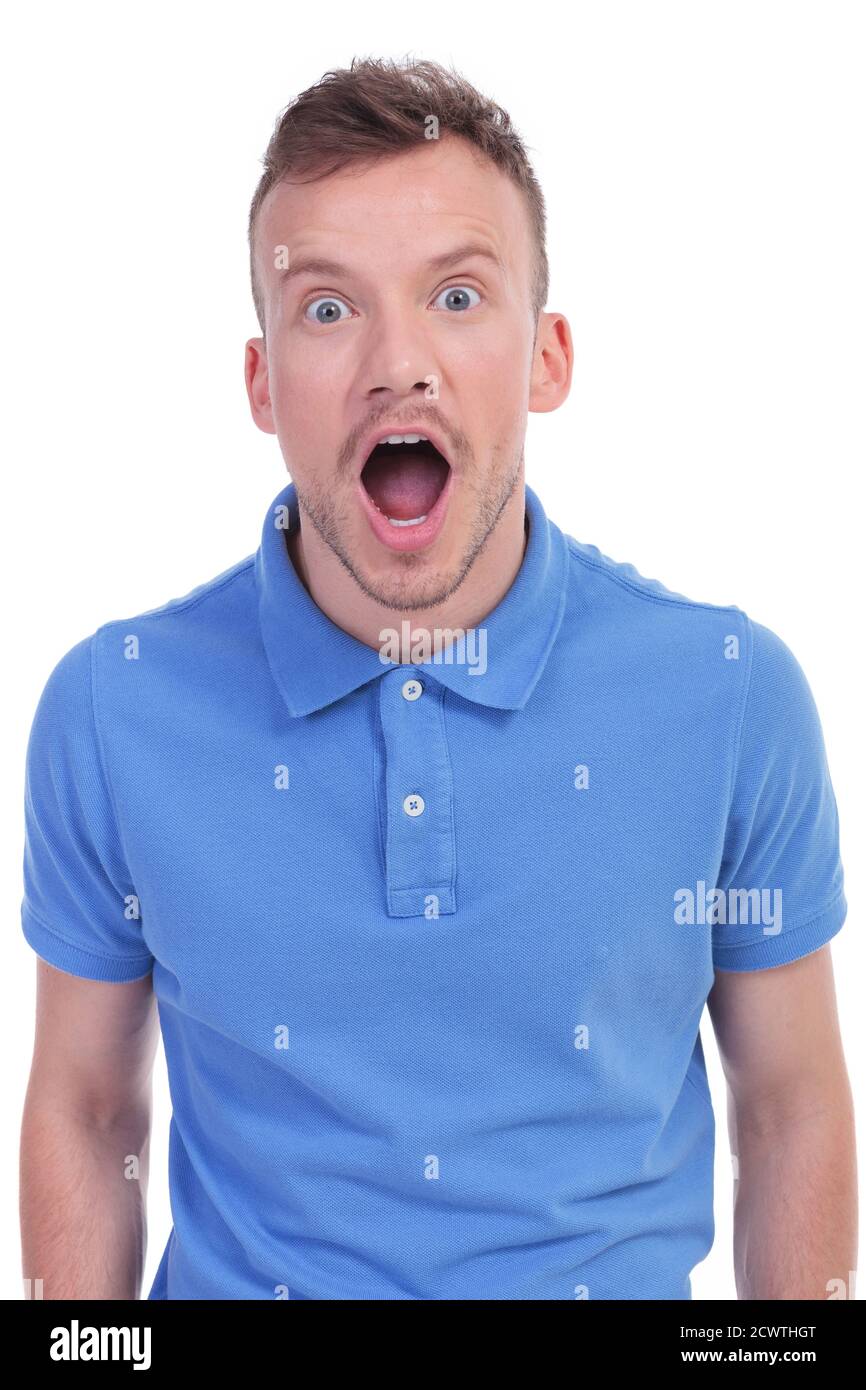 picture of a young casual man being amazed and left open mouthed ...