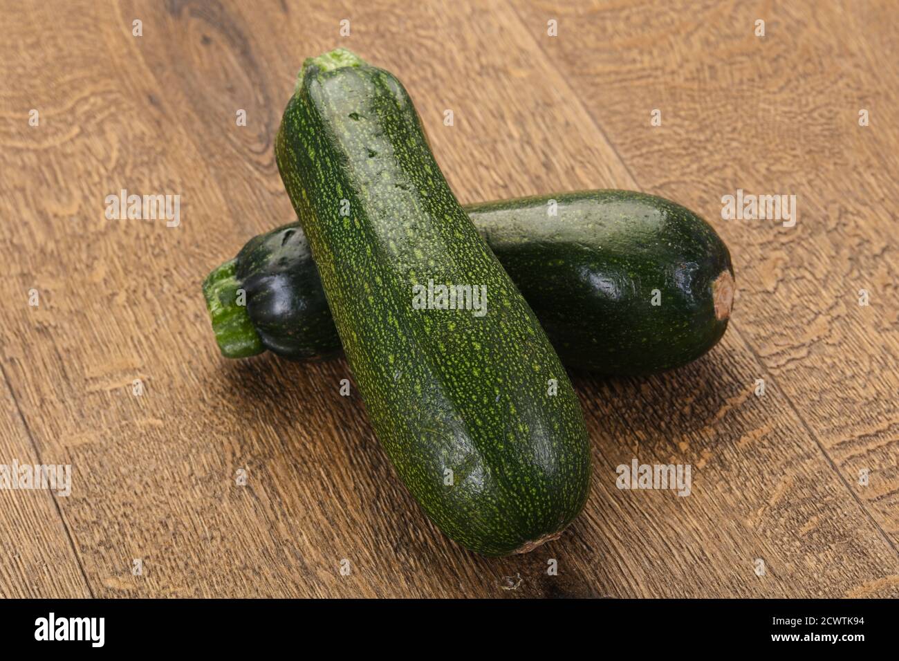 Raw ripe zucchini ready for cooking Stock Photo - Alamy