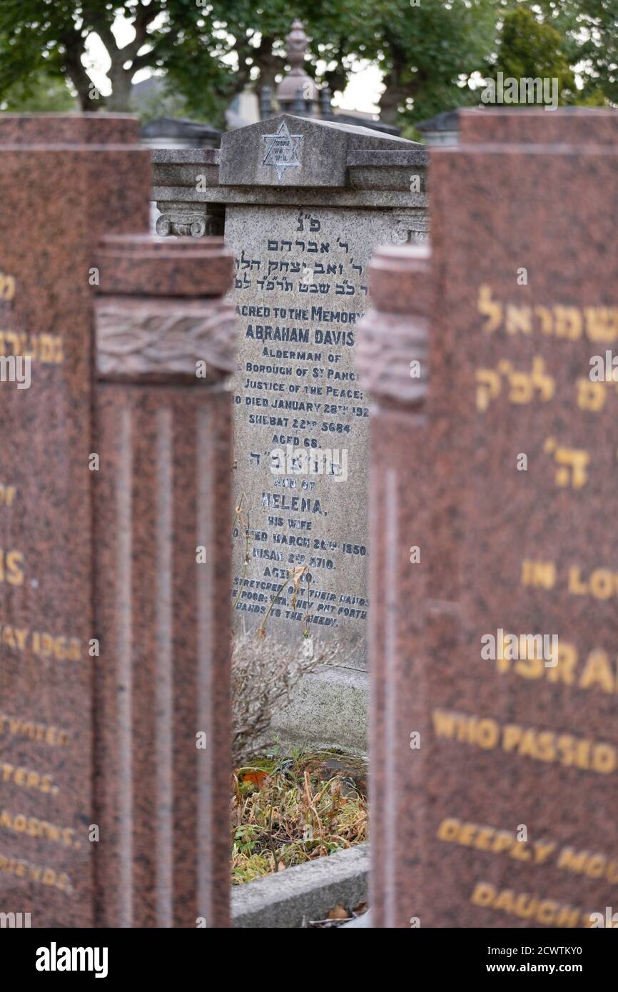 Gravestones with Hebrew and English inscriptions at historic Victorian ...