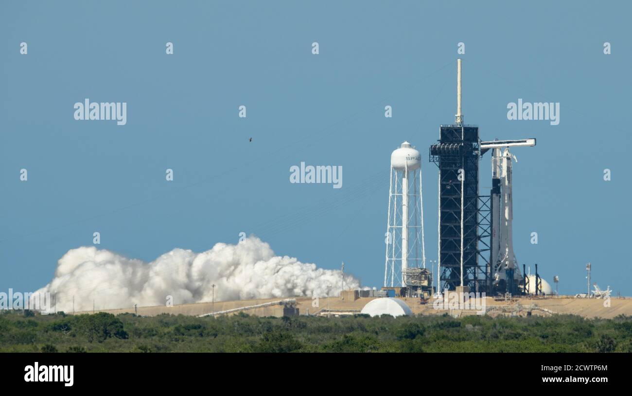 A static fire test is conducted on May 22, 2020, at Kennedy Space ...