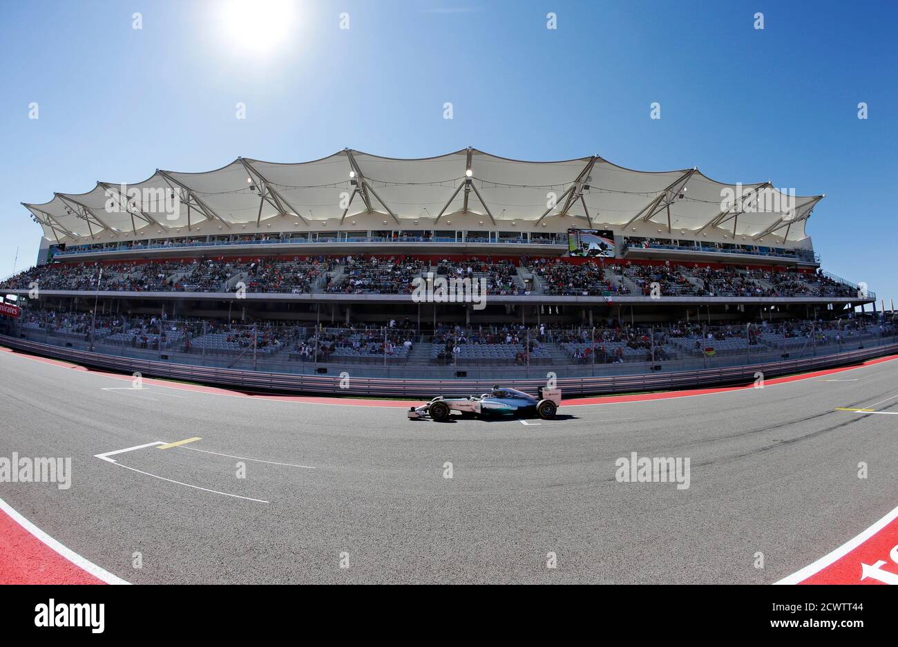 Mercedes f1 driver car stand hi-res stock photography and images - Alamy