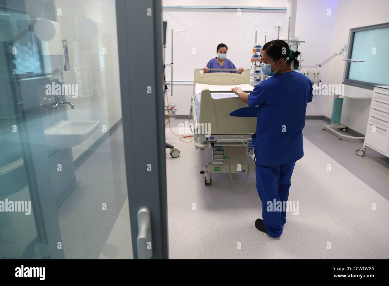 Staff nurses take part in an orientation event to familiarise ...