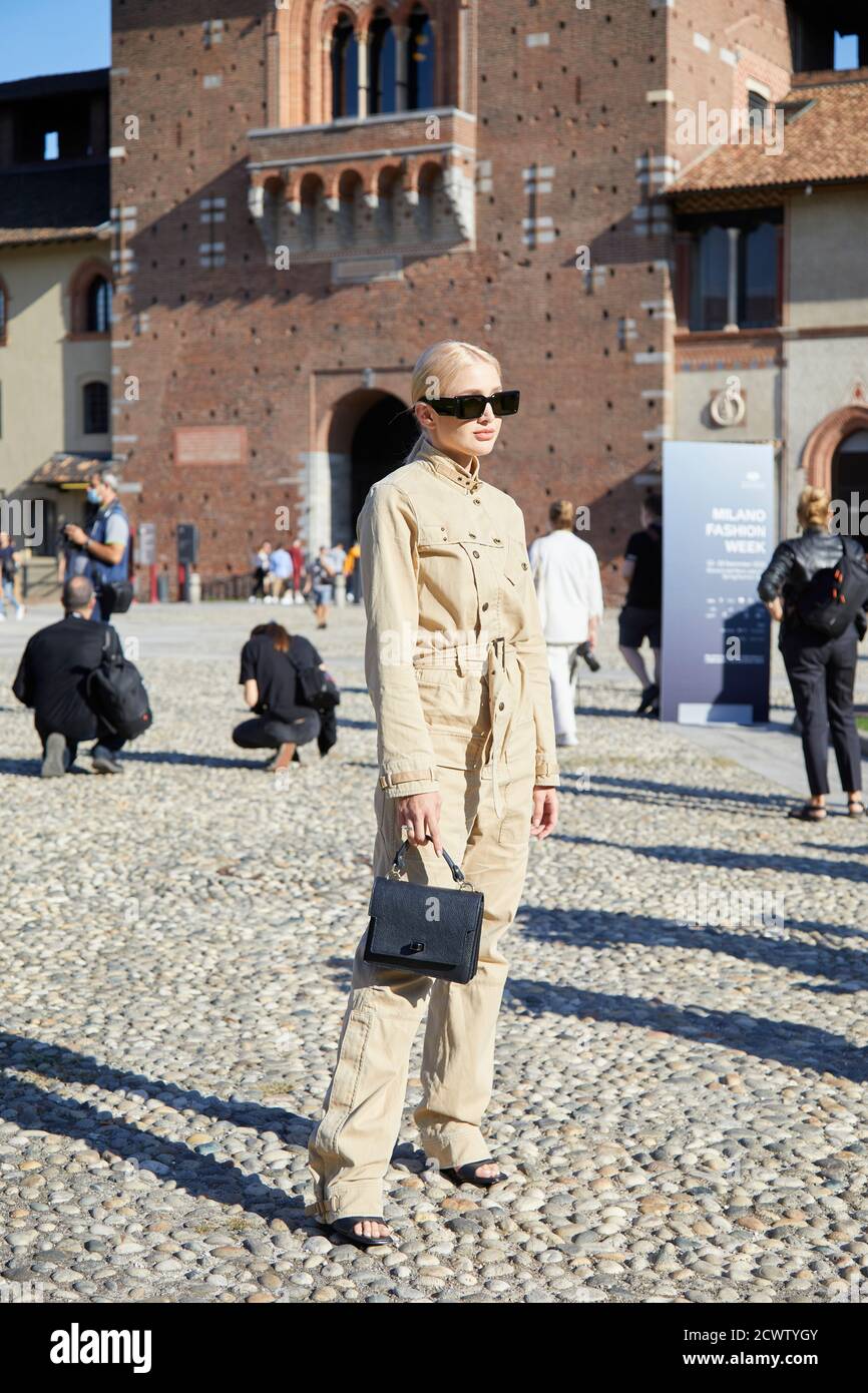 Beige overalls hi-res stock photography and images - Alamy