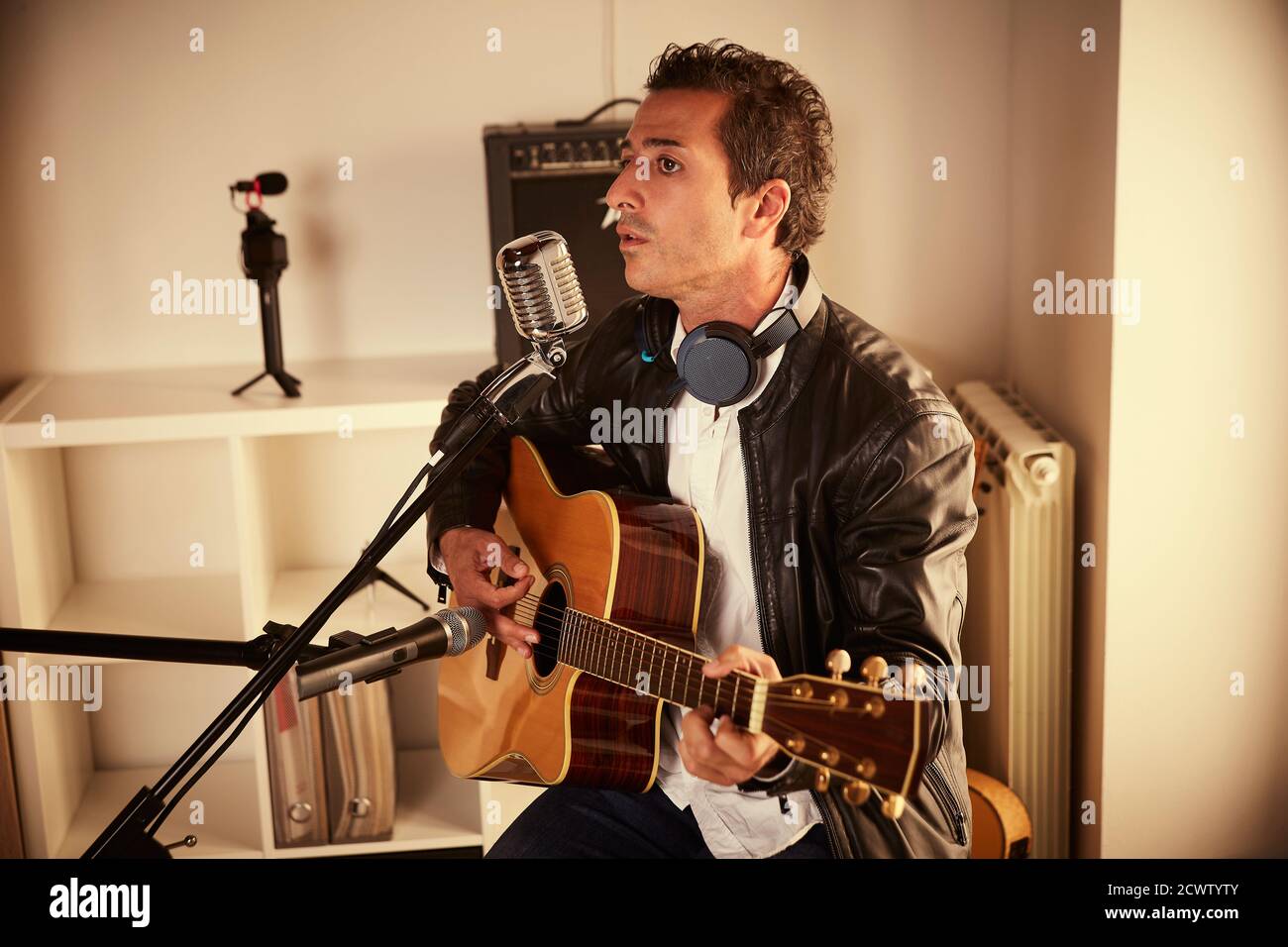 guitar player recording at home studio Stock Photo - Alamy