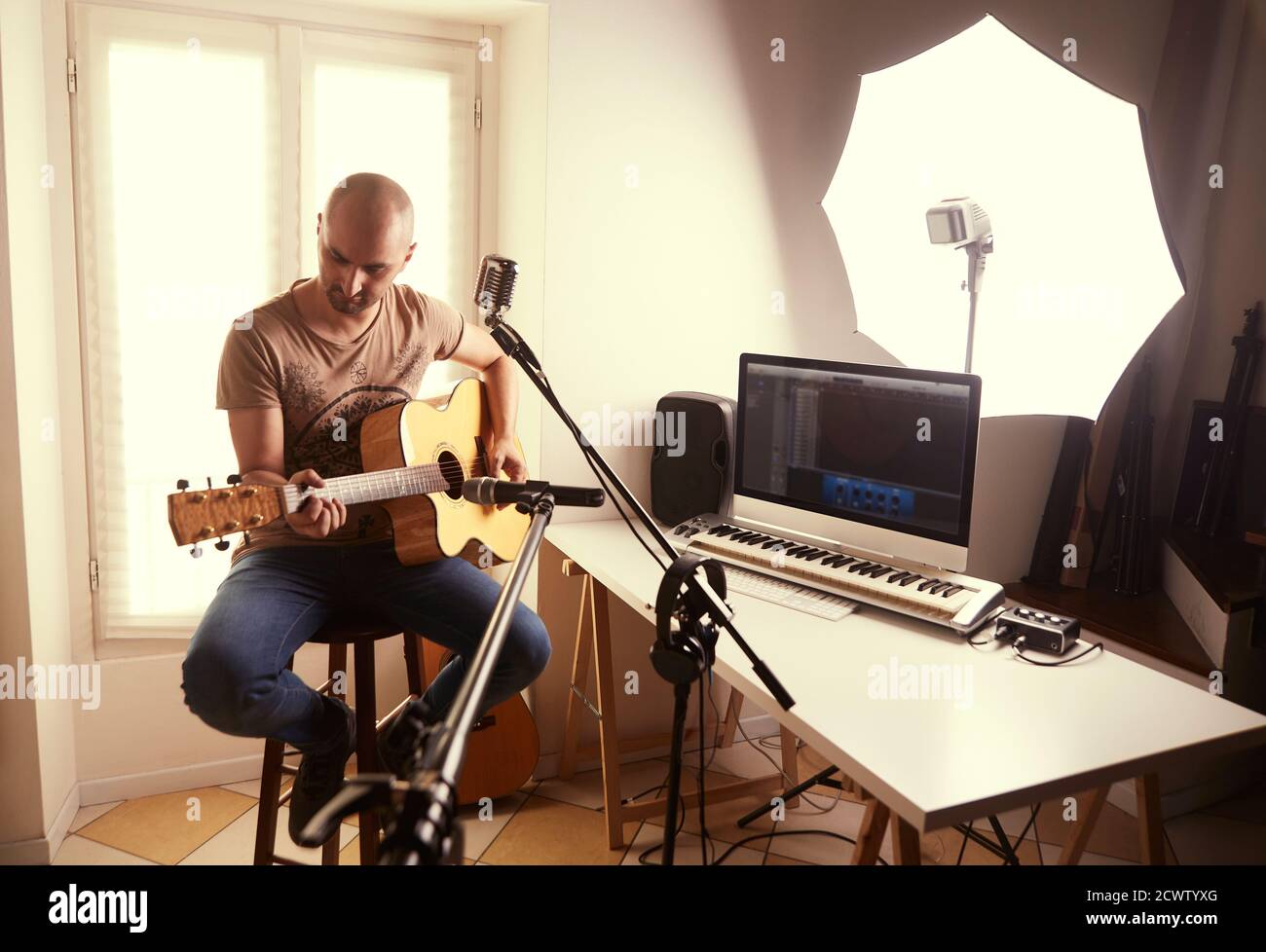 guitar player recording at home studio Stock Photo - Alamy