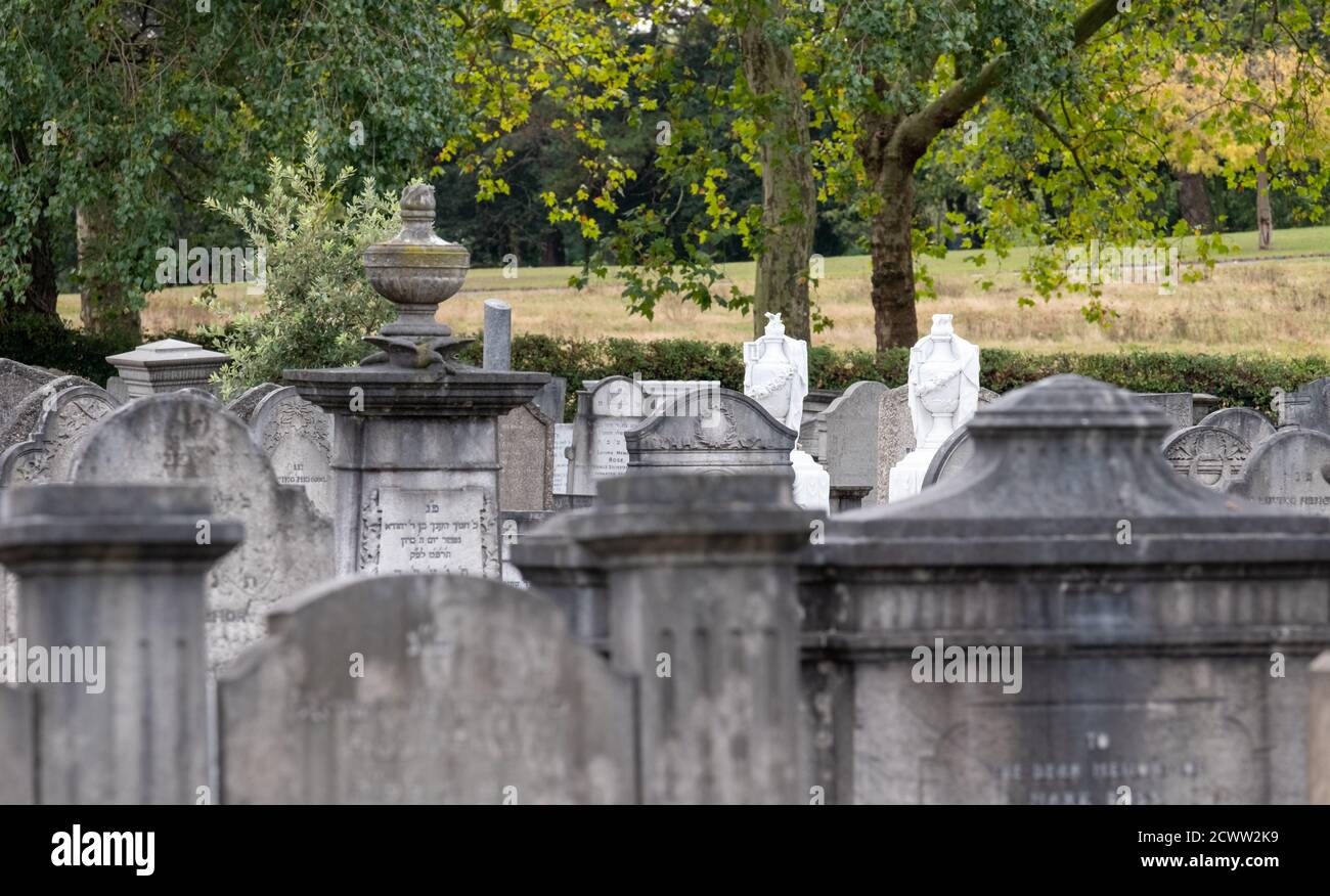 Gravestones with Hebrew and English inscriptions at historic Victorian ...