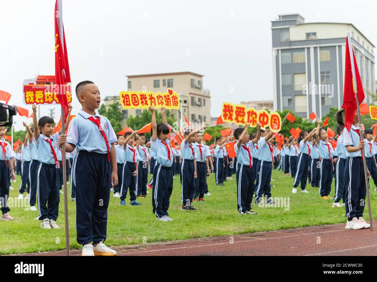 ZHONGSHAN China-September 28,2020:Chinese pupils attending a flag ...