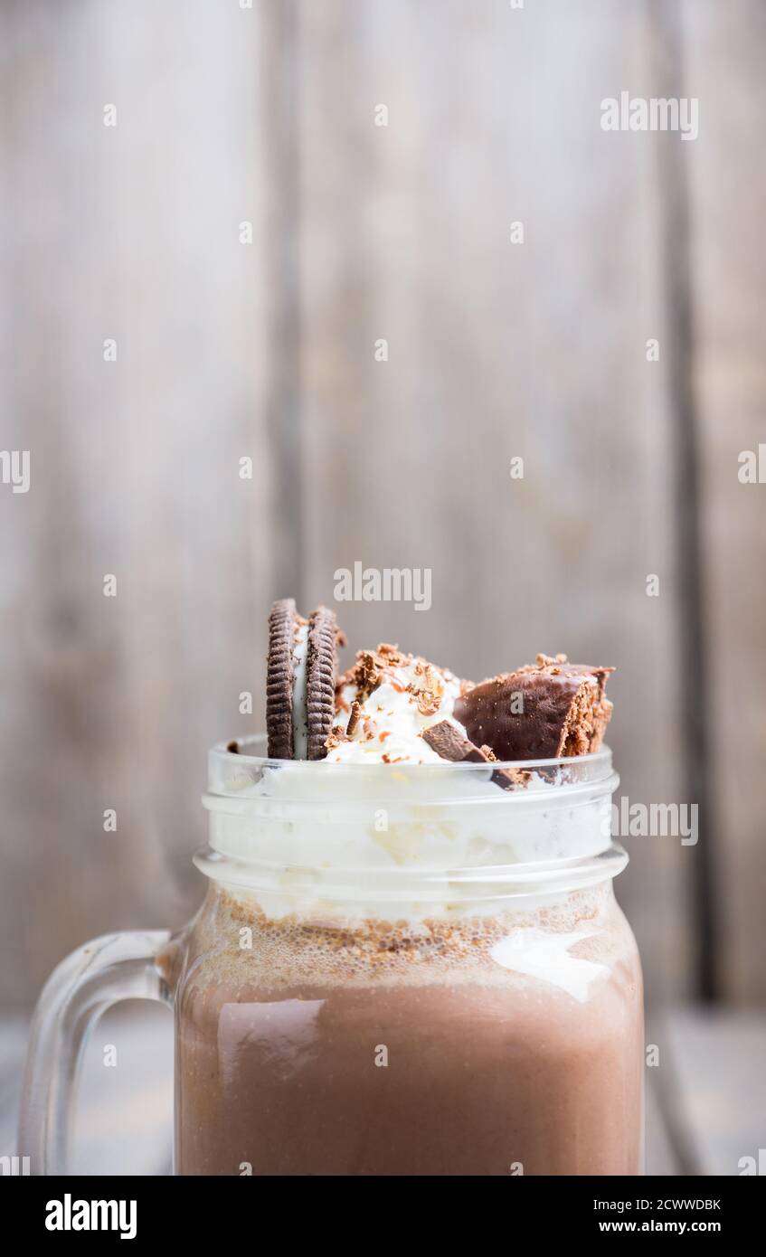 Chocolate milkshake on the rustic background. Selective focus Stock ...