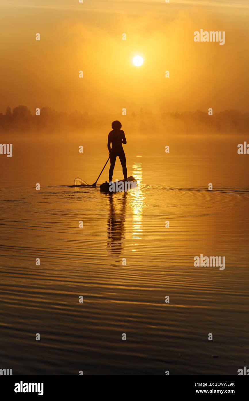 Back view man surf hi-res stock photography and images - Alamy