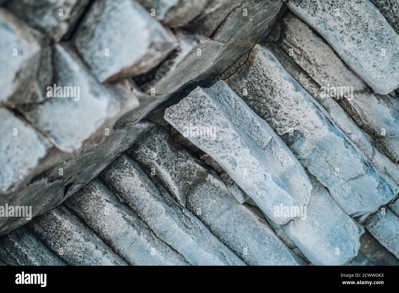 Natural stone texture. Basalt lava formations like columns. Icelandic ...