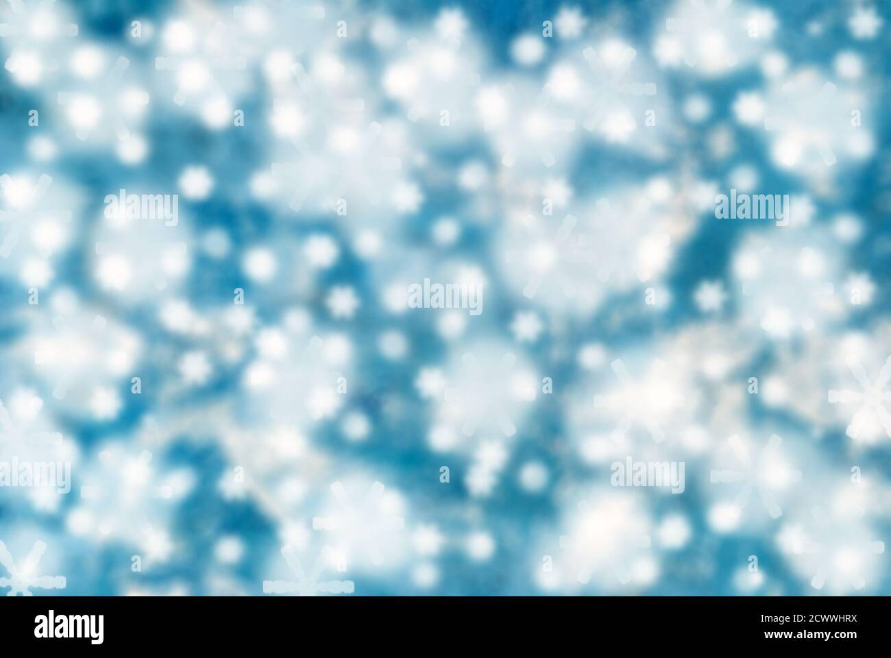 Falling snow on blue background hi-res stock photography and images - Alamy