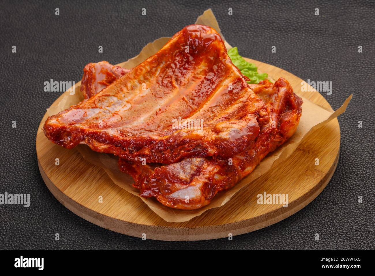 Raw marinated pork ribs ready for cooking Stock Photo - Alamy