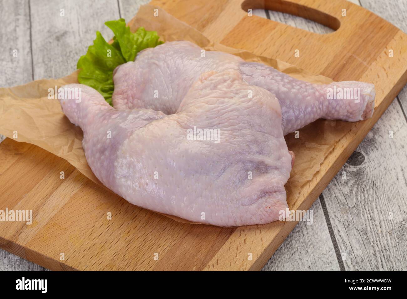 Raw chicken leg ready for cooking Stock Photo - Alamy