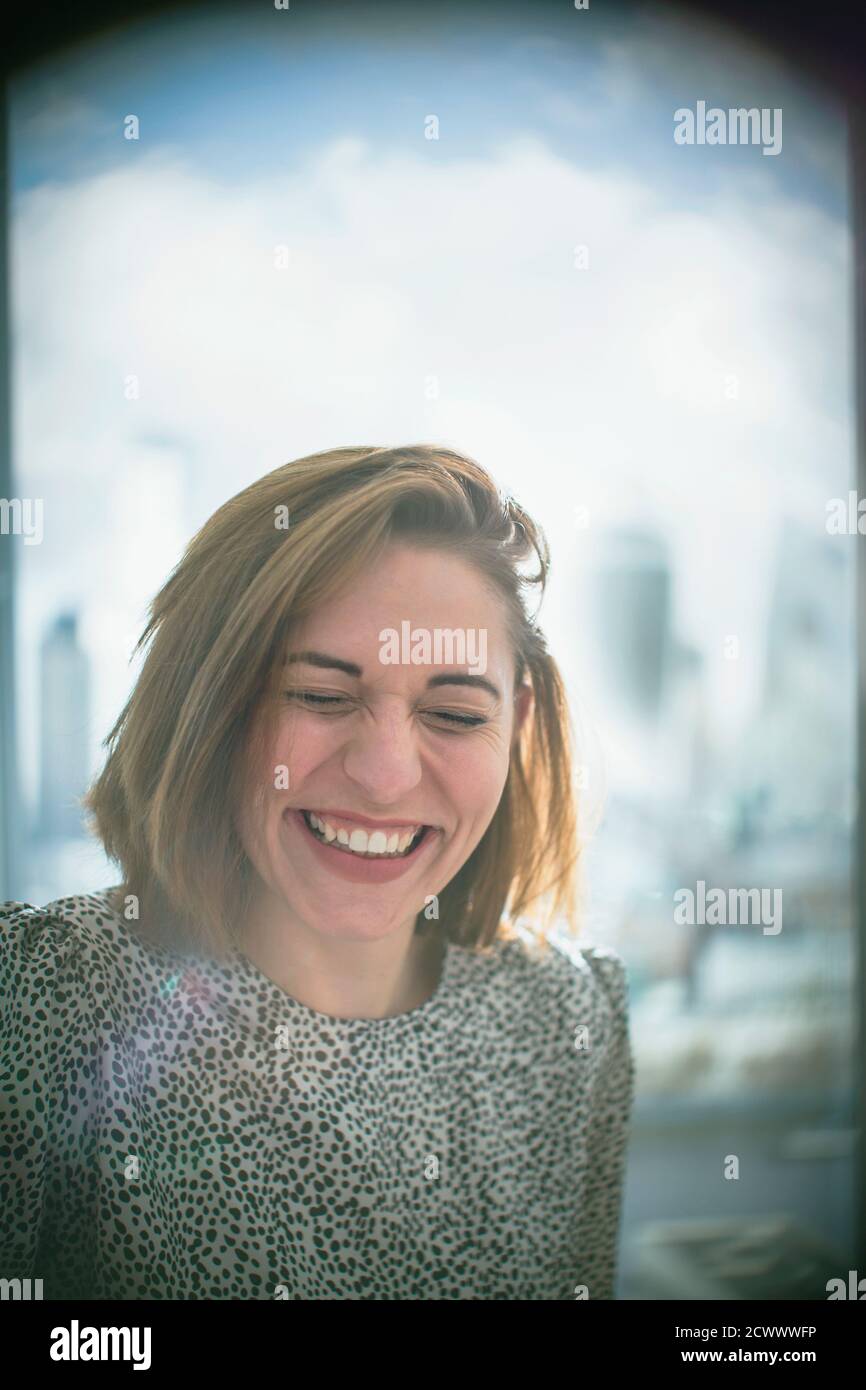 Businesswoman at window hi-res stock photography and images - Alamy