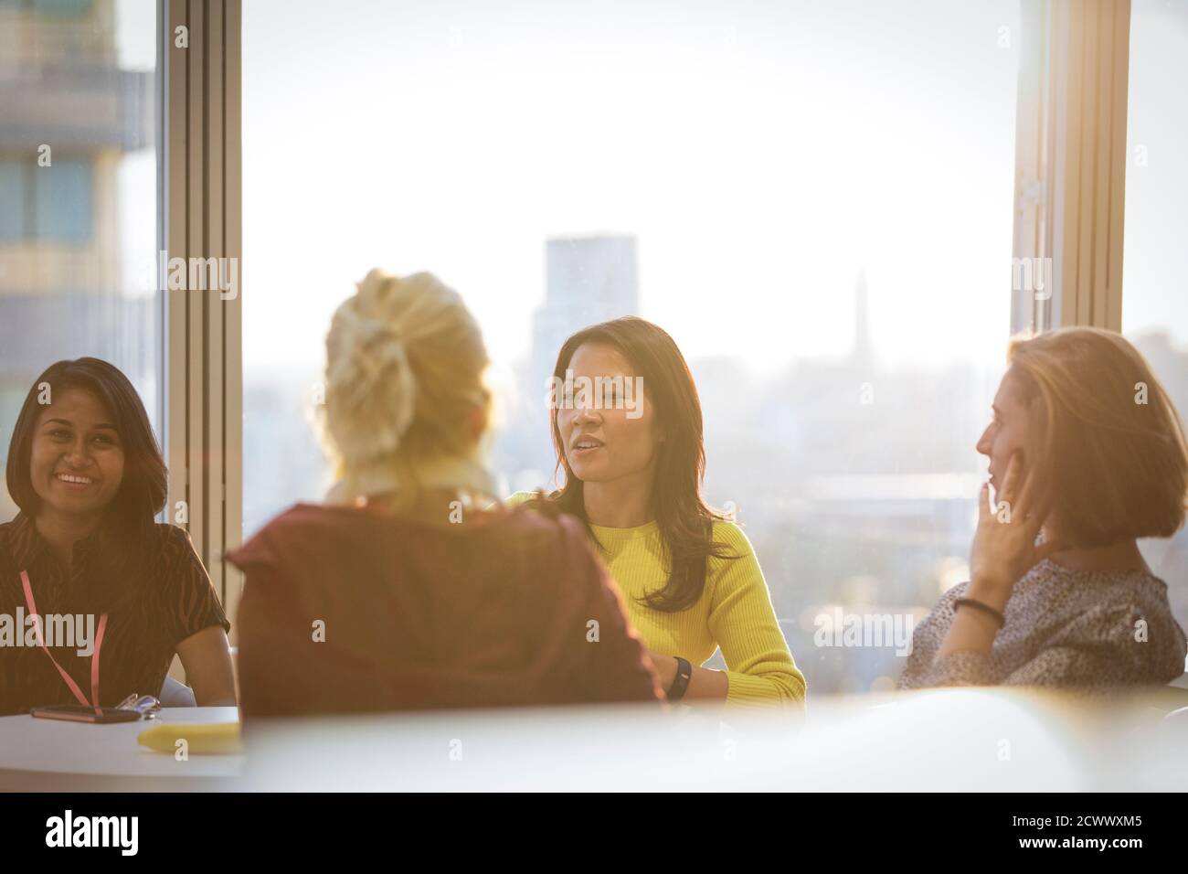 Businesswomen talking in conference room meeting Stock Photo - Alamy