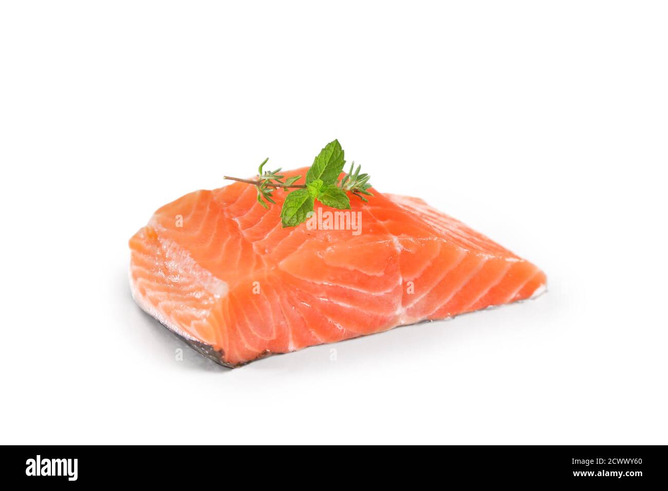 raw salmon fillet on white background,raw fish, pepper and aromatic her ...
