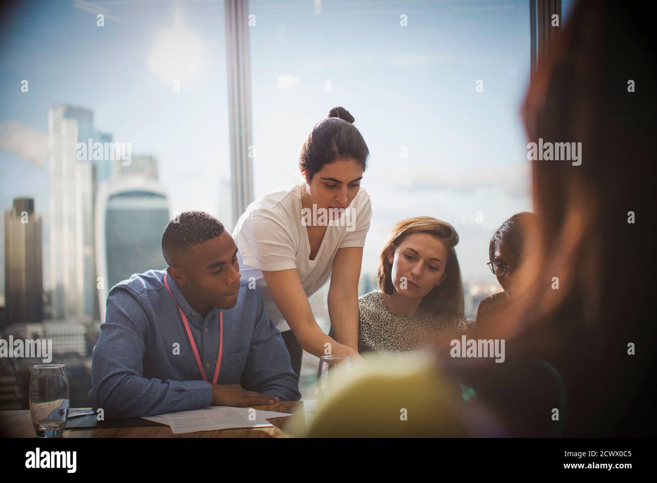 Business people talking in conference room meeting Stock Photo - Alamy