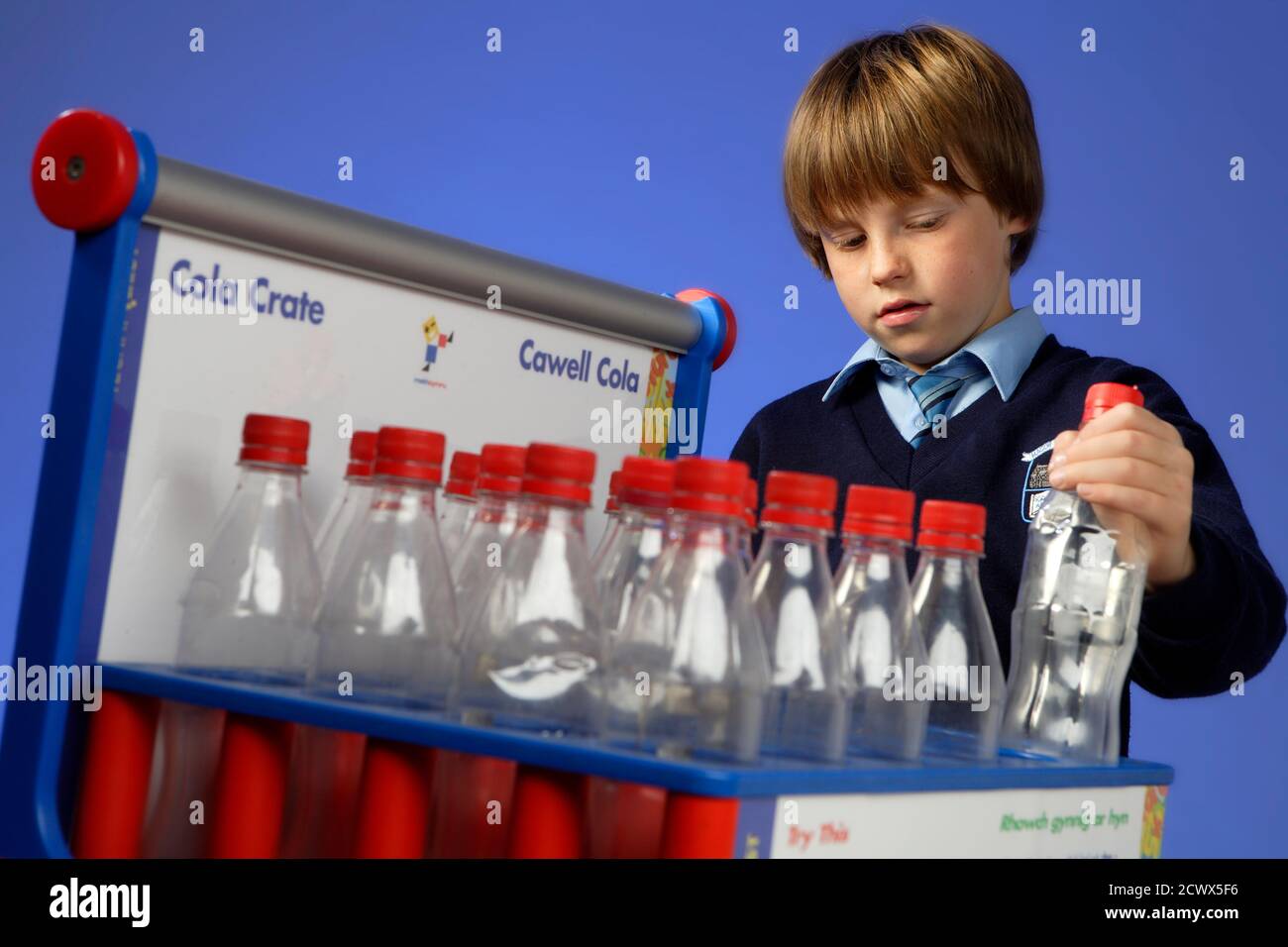 Children Engaging with Practical Learning Games Stock Photo - Alamy