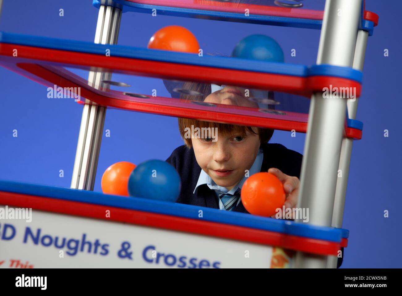 Children Engaging with Practical Learning Games Stock Photo - Alamy