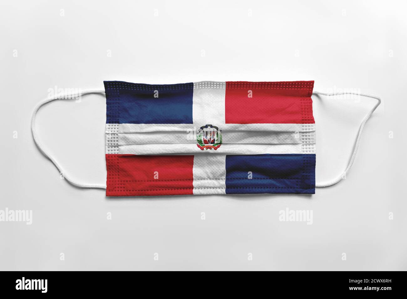 Face mask with Dominican Republic flag printed, on white background ...