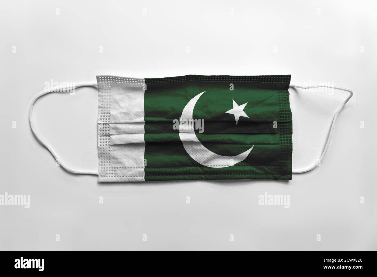 Face mask with Pakistan flag printed, on white background, isolated ...
