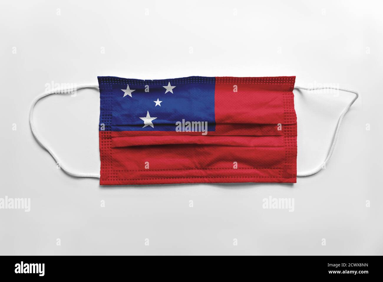 Face mask with Samoa flag printed, on white background, isolated. Covid ...