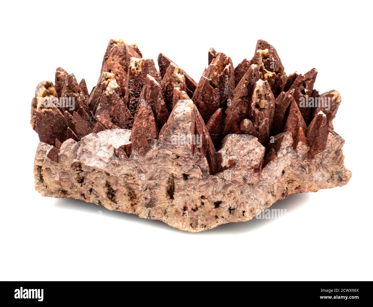 large red rock crystal quartz isolated on white background Stock Photo ...
