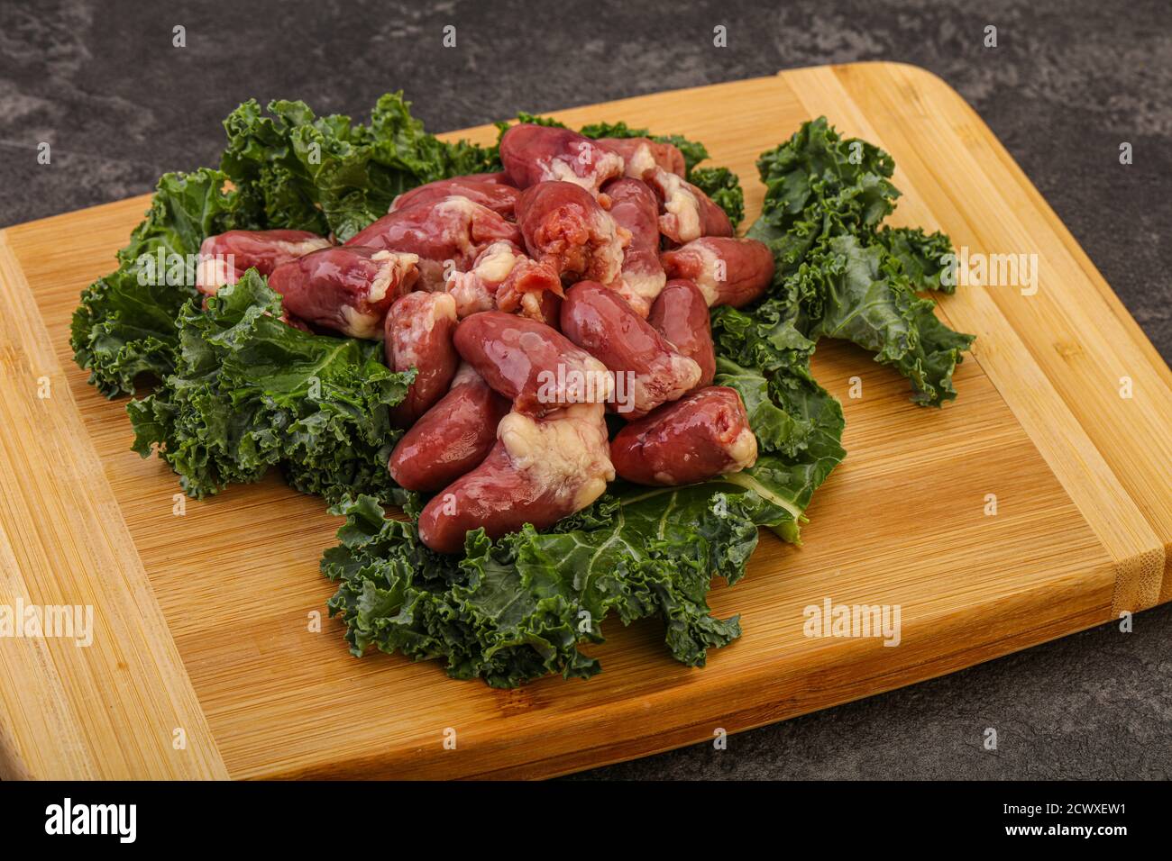 Raw chicken hearts heap for cooking Stock Photo - Alamy