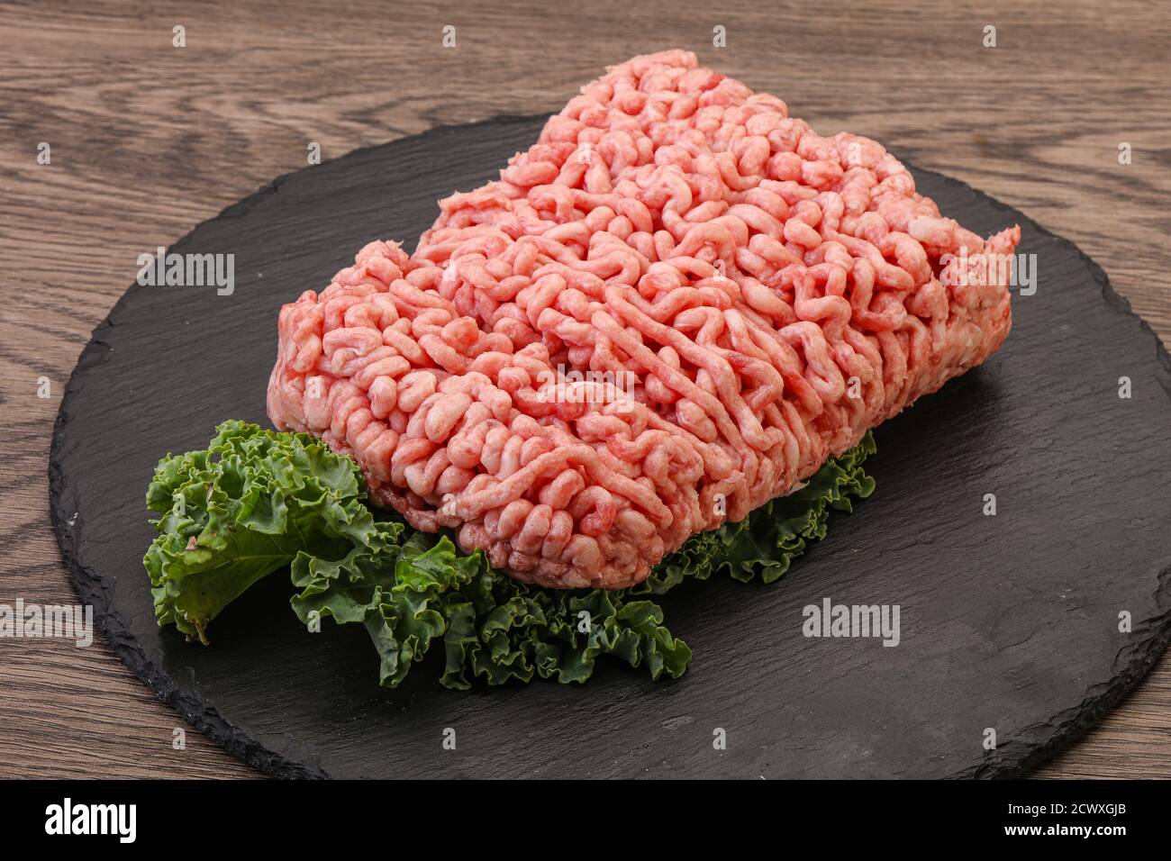 Raw pork minced meat with spices for cooking Stock Photo - Alamy