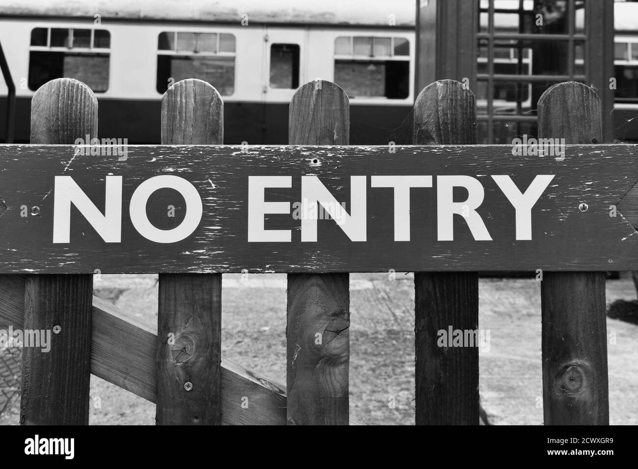 Sign in front gate Black and White Stock Photos & Images - Alamy