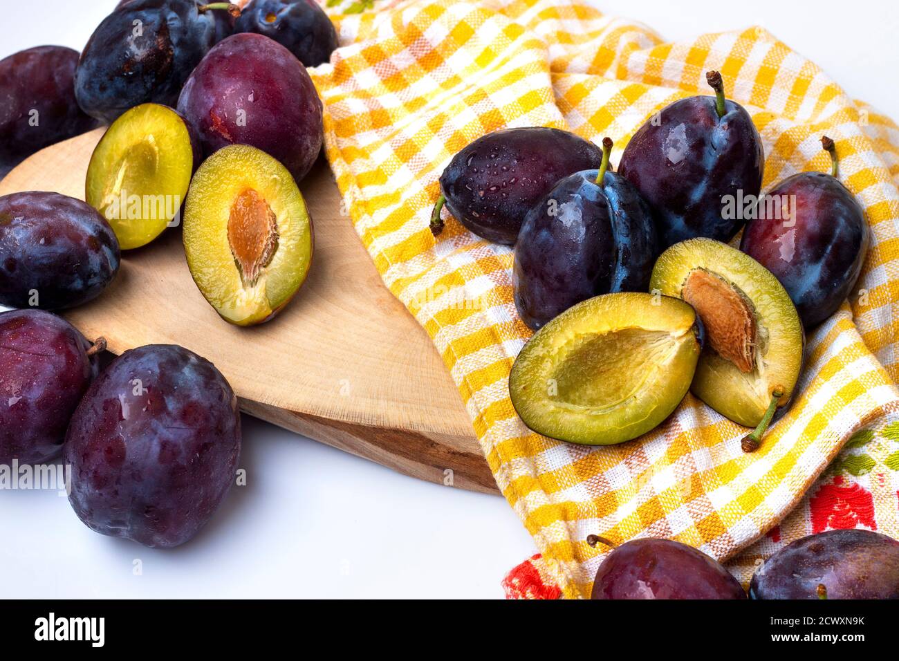 Fresh moyer purple plums isolated on a white background Stock Photo - Alamy