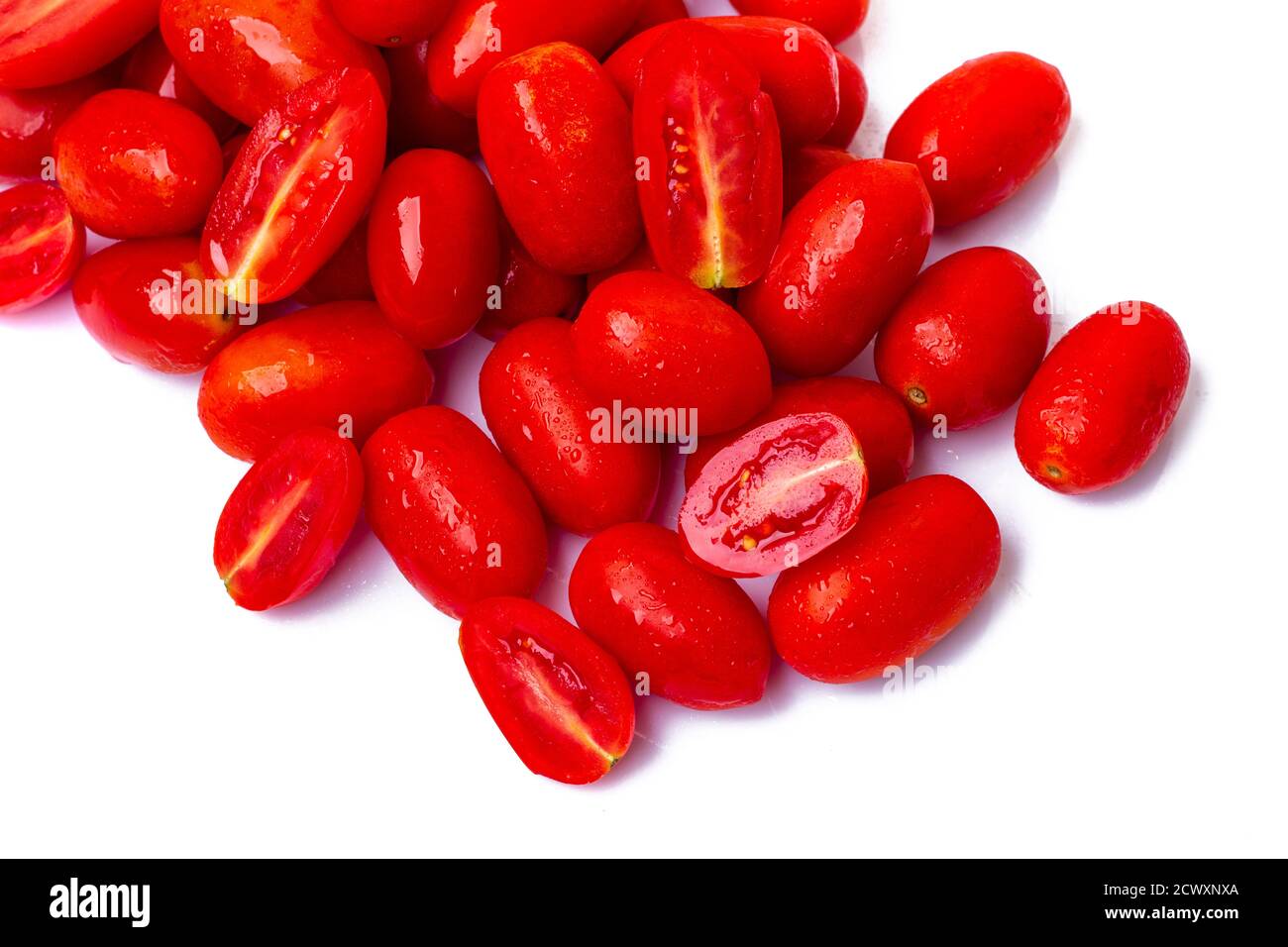 Group of Mini roma red tomatoes isolated on a white background Stock ...