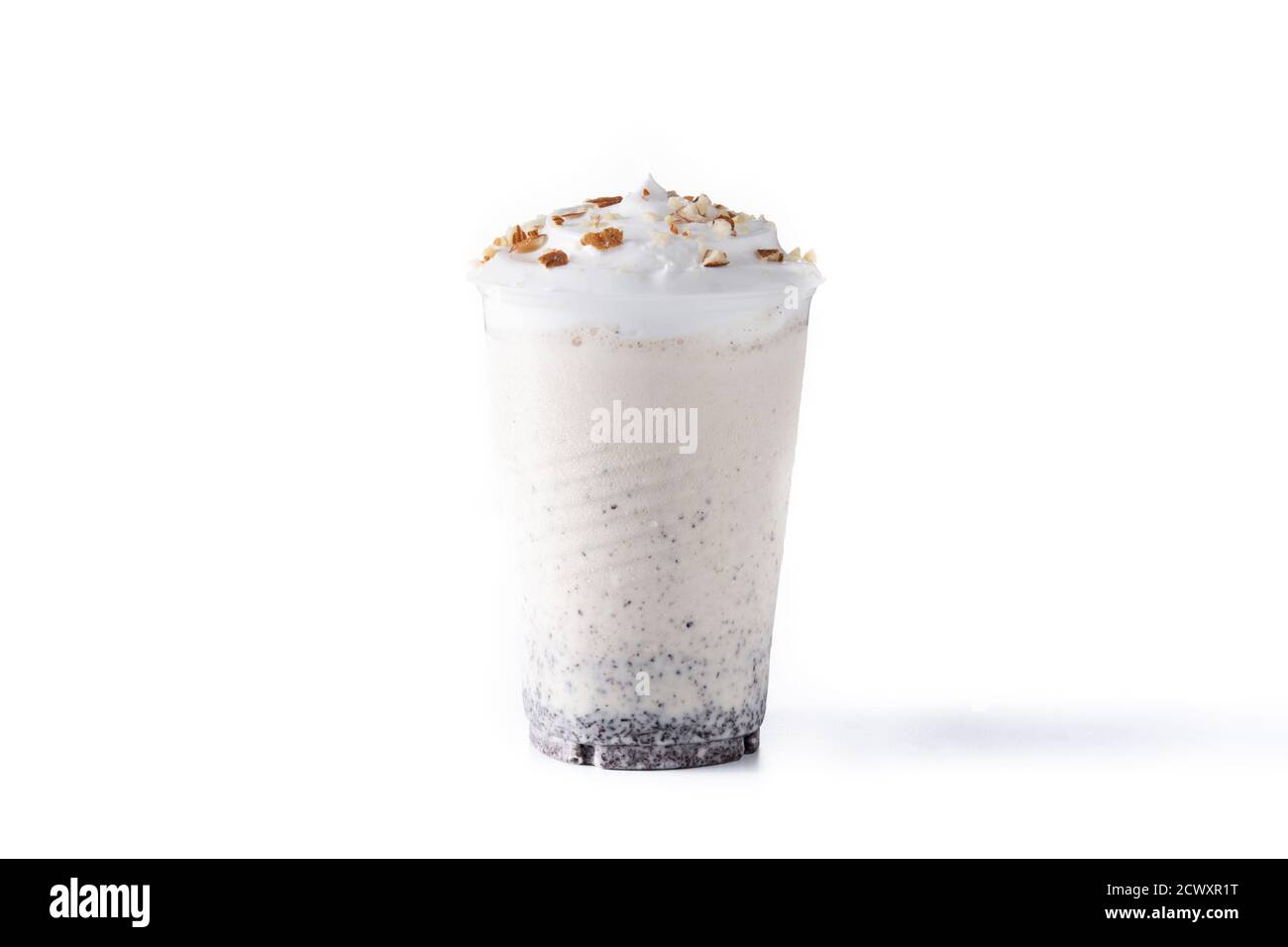 White chocolate, vanilla and nuts iced milkshake isolated on white ...