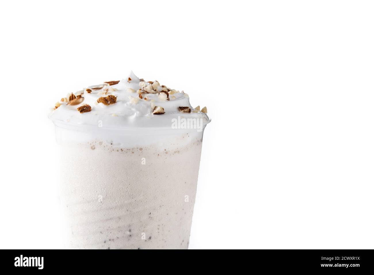 White chocolate, vanilla and nuts iced milkshake isolated on white ...