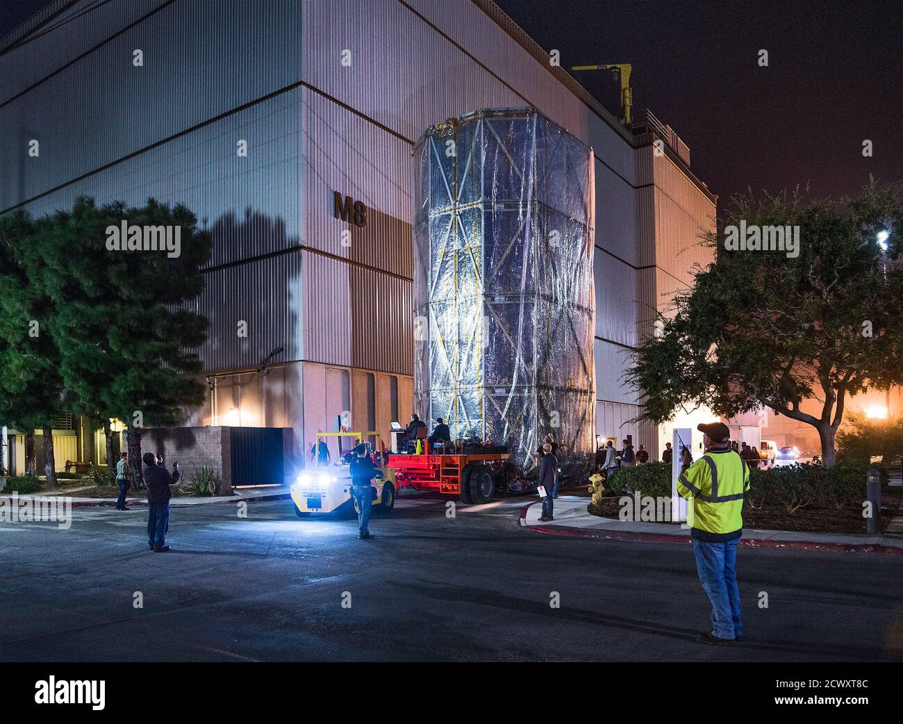 NASA's James Webb Space Telescope is wrapped in a mobile clean room to ...