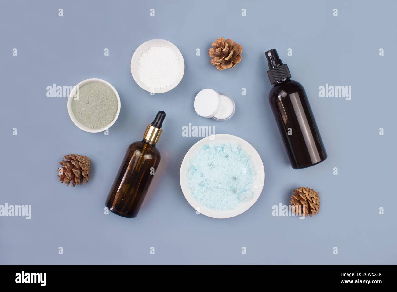 Sea salt, serum in brown dropper glass and spray bottle, clay, cream ...