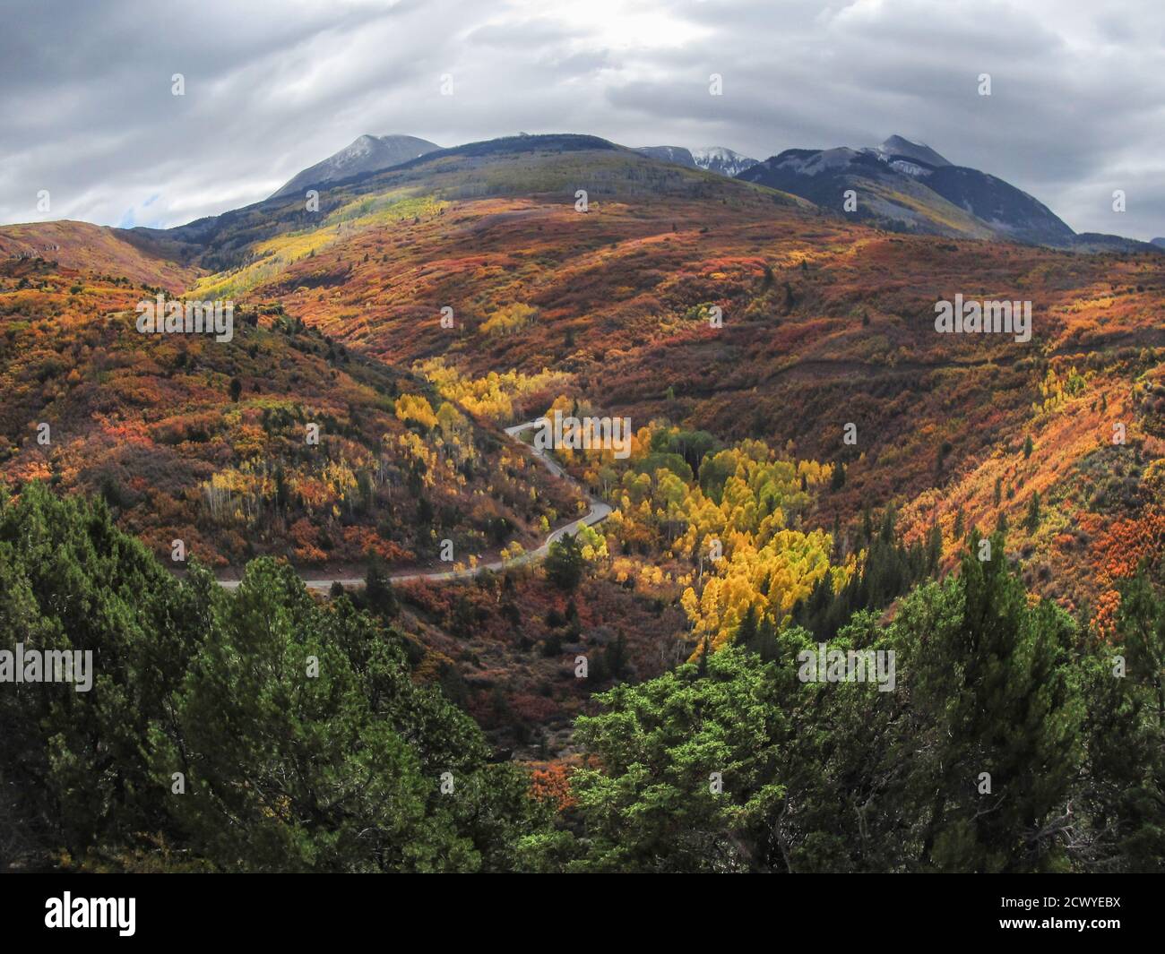 The La Sal Mountains of Utah, USA, in shadow of a coming storm and a ...