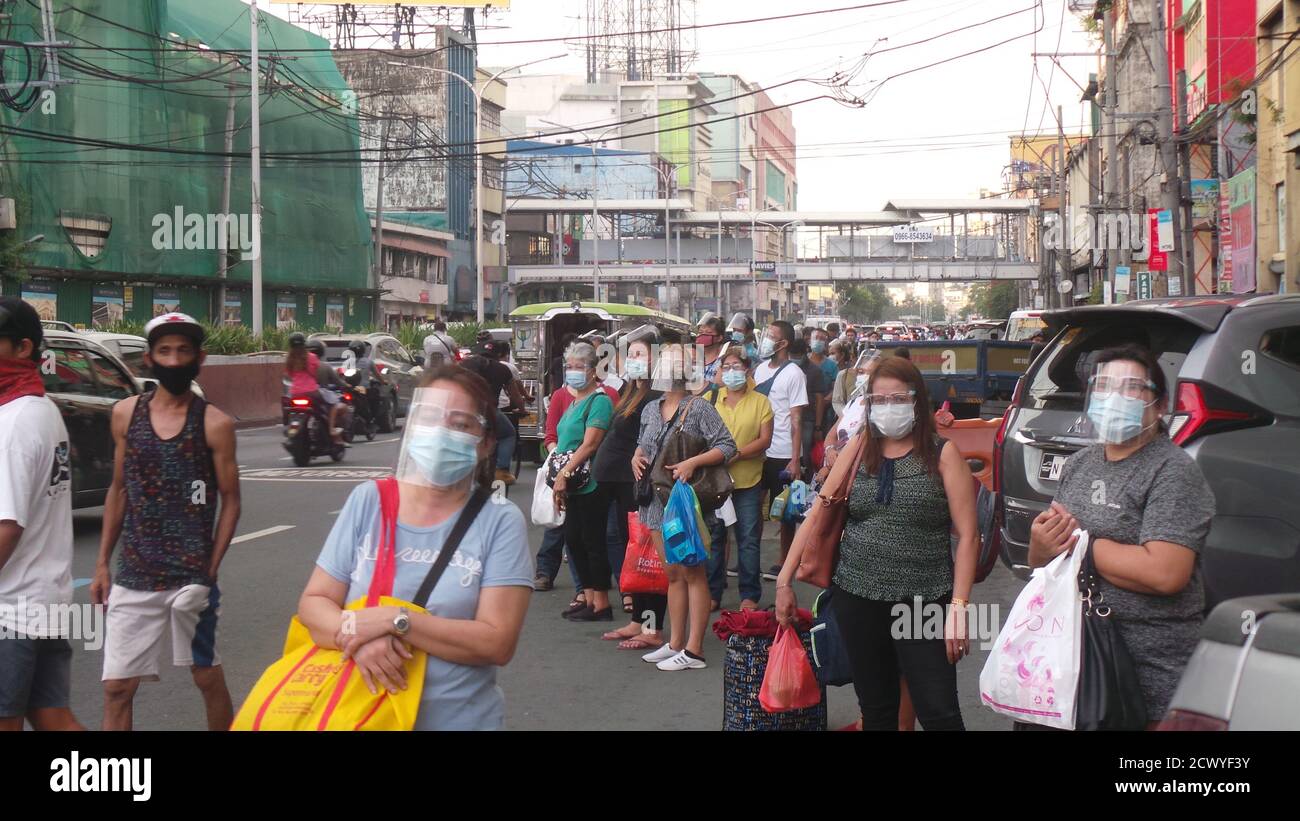 Manila, Philippines. 05th Jan, 2012. Long queue of commuters are seen ...