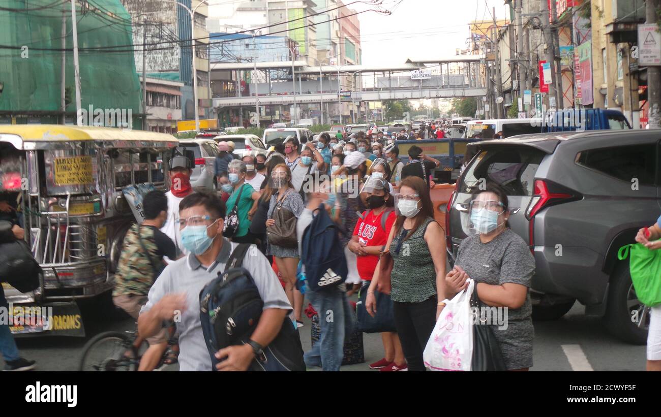Manila, Philippines. 05th Jan, 2012. Long queue of commuters are seen ...