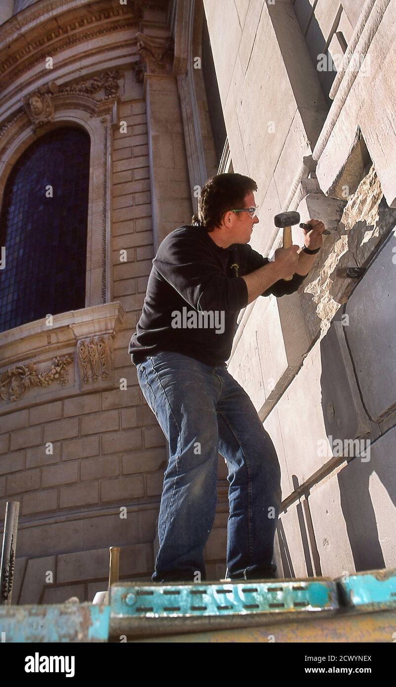 WW2 war damage repair by stonemason's on St Paul's Cathedral in the ...