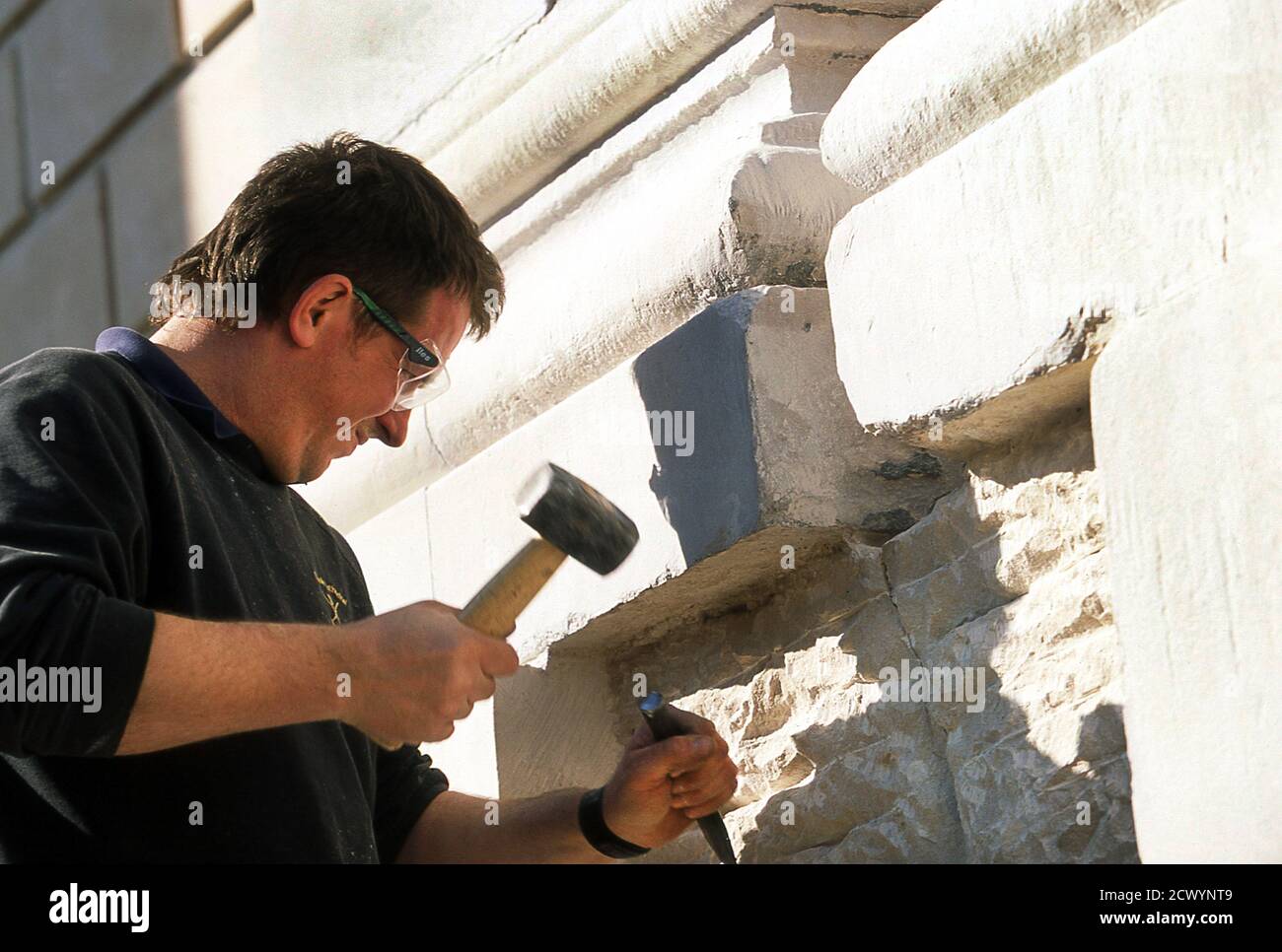 WW2 war damage repair by stonemason's on St Paul's Cathedral in the ...