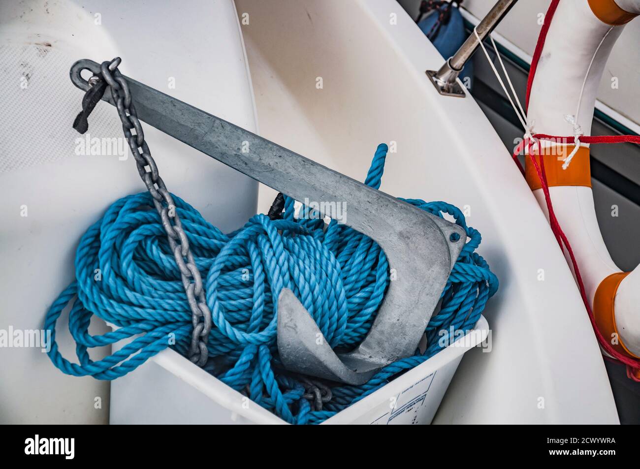 Close up of the anchorage box with anchor and chain and rope in it ...
