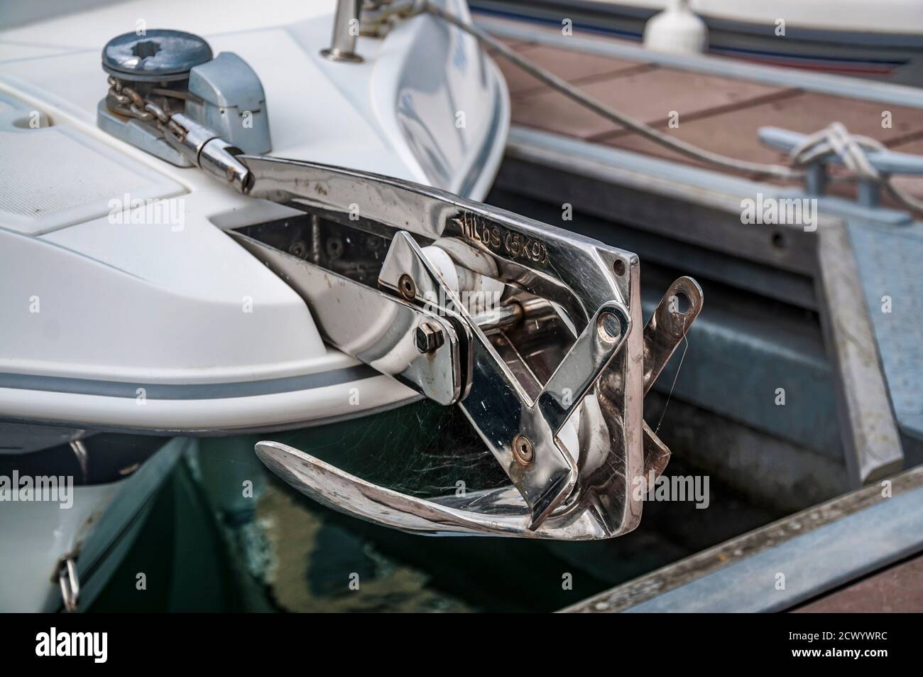 Close up of the boat bow with anchor on it. Connection visual concept ...