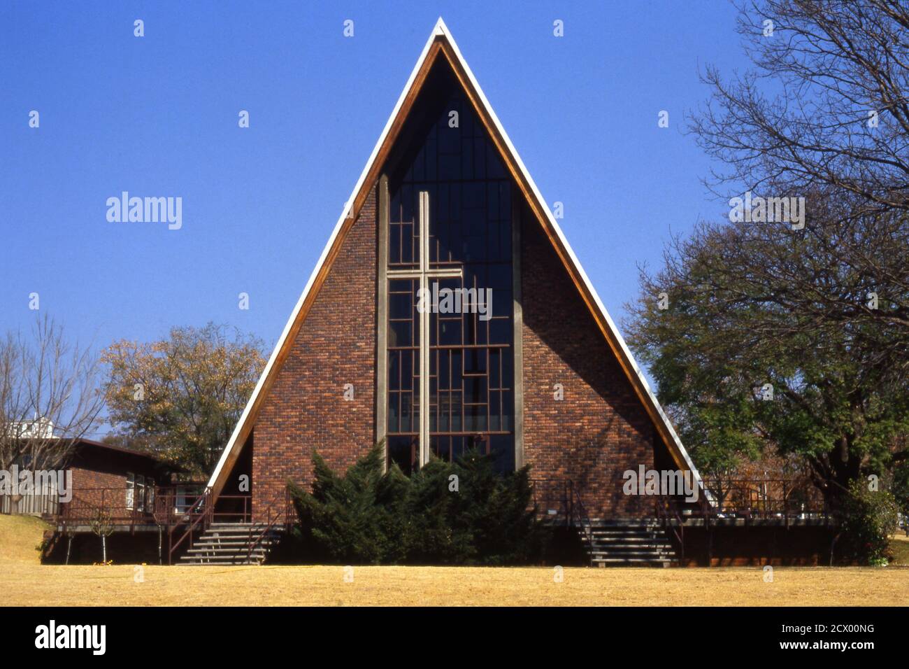 Attractive modern church in form of a triangle, with large slender ...