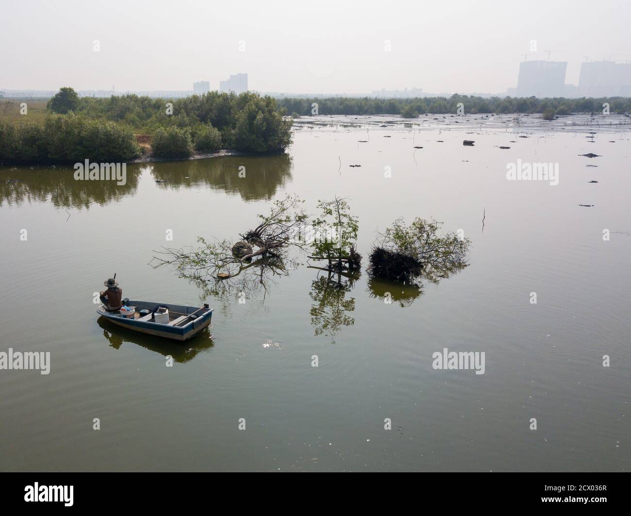 Batu Kawan, Penang/Malaysia - Sep 24 2019: Fisheman relax on boat Stock ...