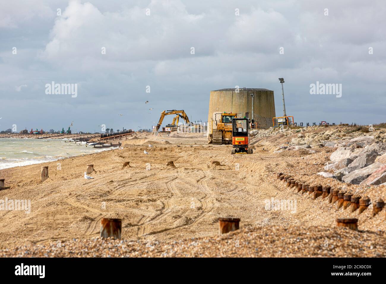 Rock sea defences on beach hi-res stock photography and images - Alamy