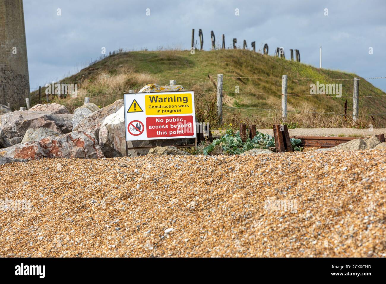 A warning, no public access sign on the beach at Hythe Ranges, Kent UK ...