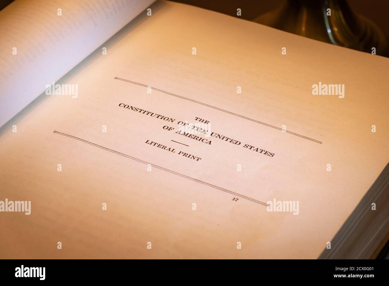 Open book shows title page of the Constitution of the United States of ...